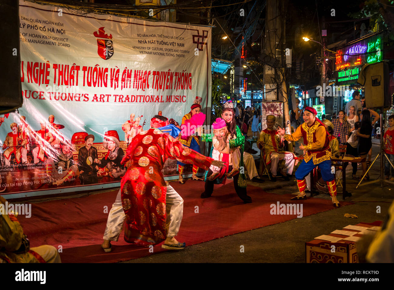Traditional theatre entertainment in in a street in the Old Quarter ...