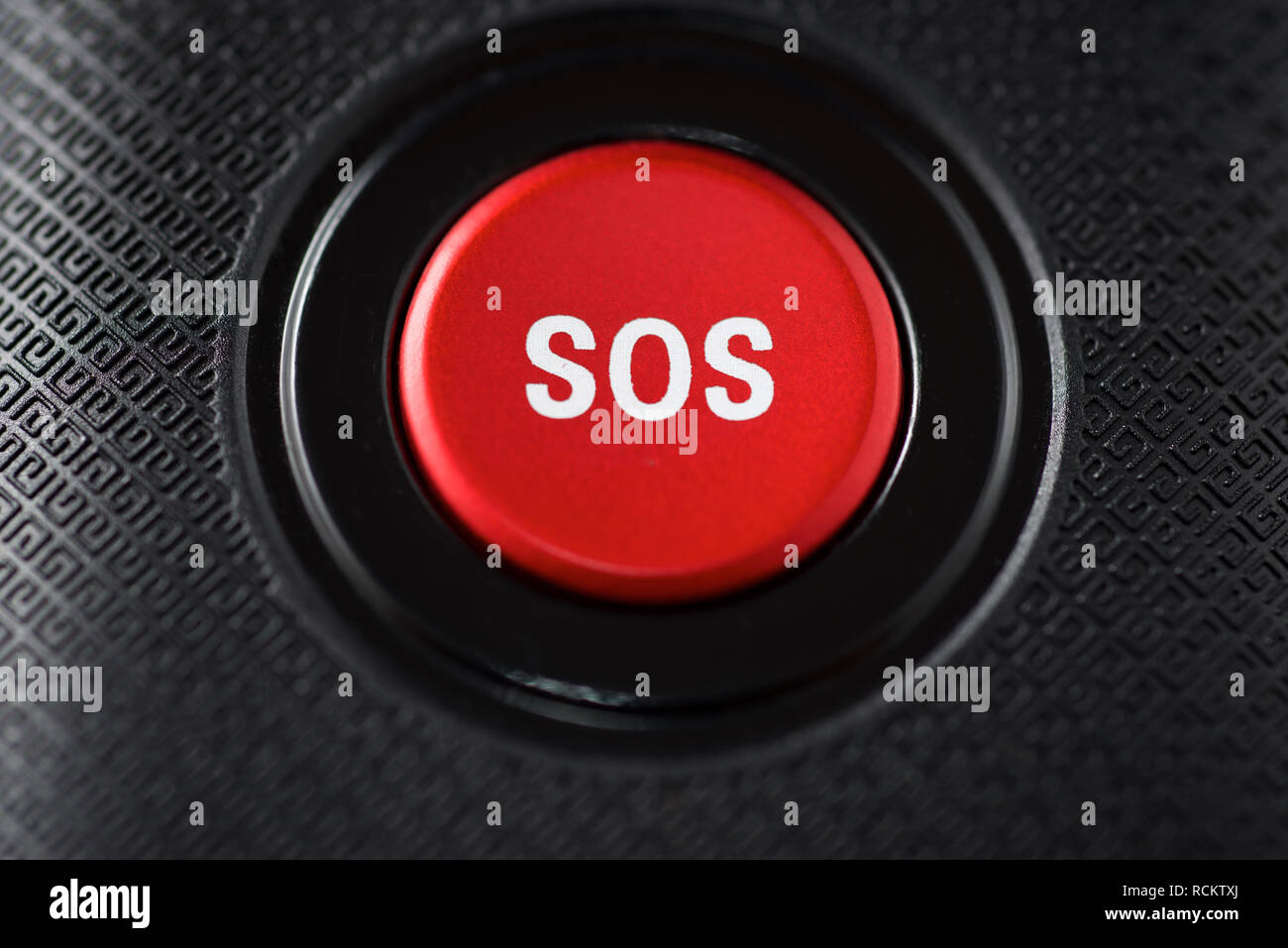 SOS button on an electronic device Stock Photo - Alamy