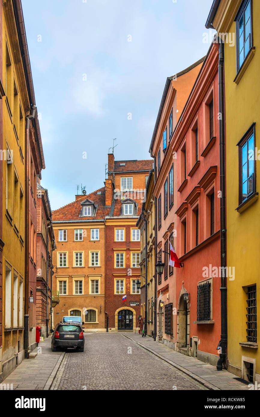 Warsaw, Mazovia / Poland - 2018/12/15: Typical old town street with XIX ...