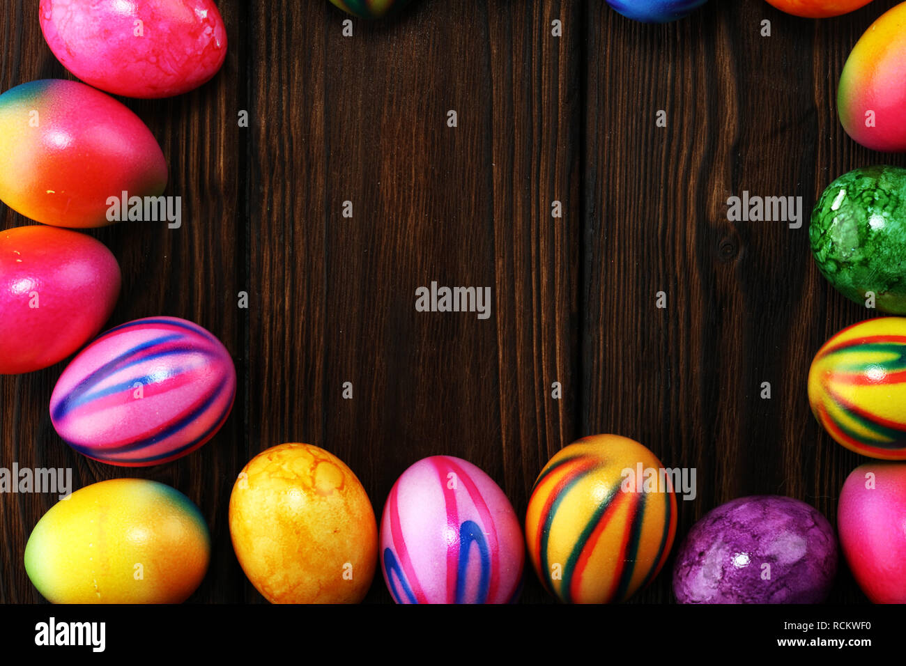 Row of Easter eggs on table. colorful easter decoration Stock Photo - Alamy