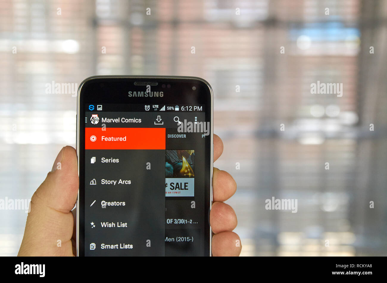 MONTREAL, CANADA - APRIL 5, 2016 : Marvel Comics app on a cell phone ...