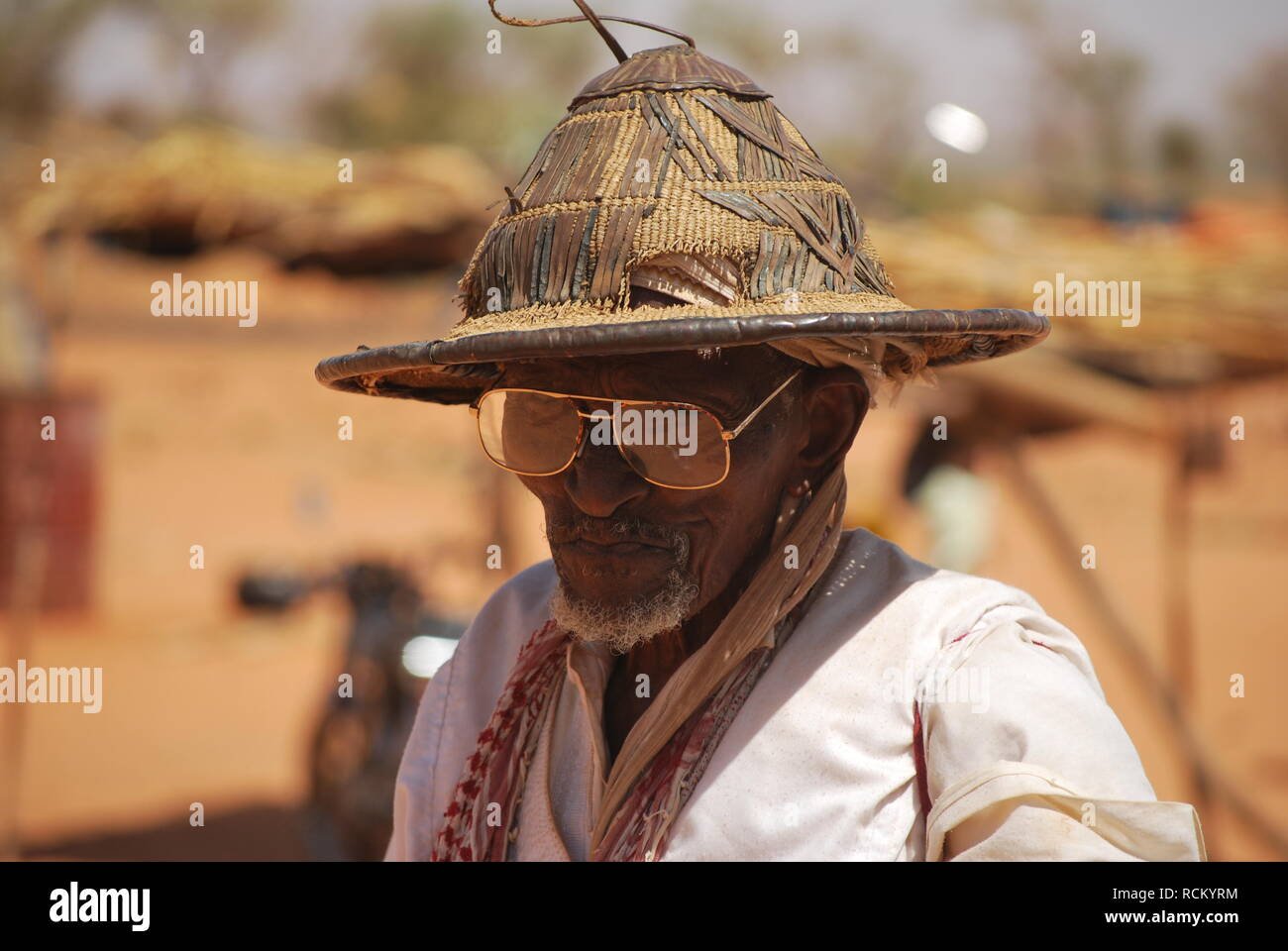 An elderly Fulani man with hat and glasses in Niger, Africa Stock Photo ...