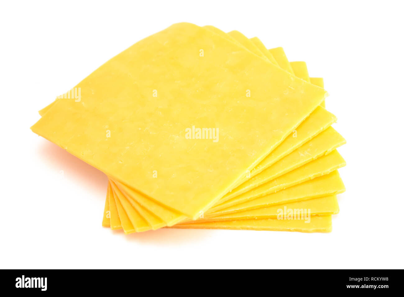 Slices of Cheddar Sandwich Cheese on a White Background Stock Photo - Alamy