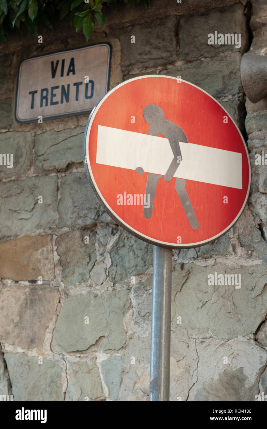 No Entry road sign defaced by street artist, Florence, Italy Stock ...