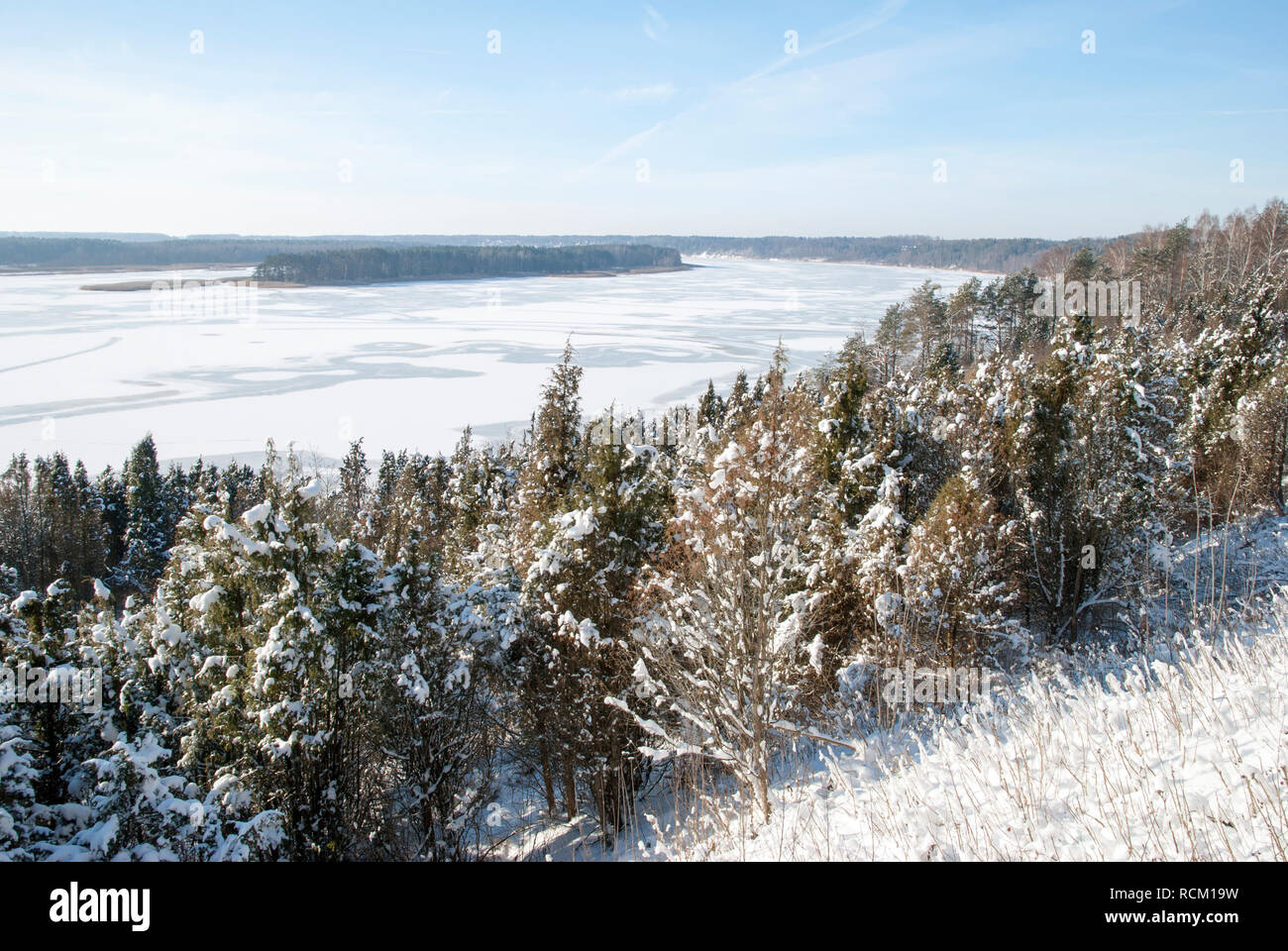 The scenic view of Neman River under the ice with the Island of Birds ...