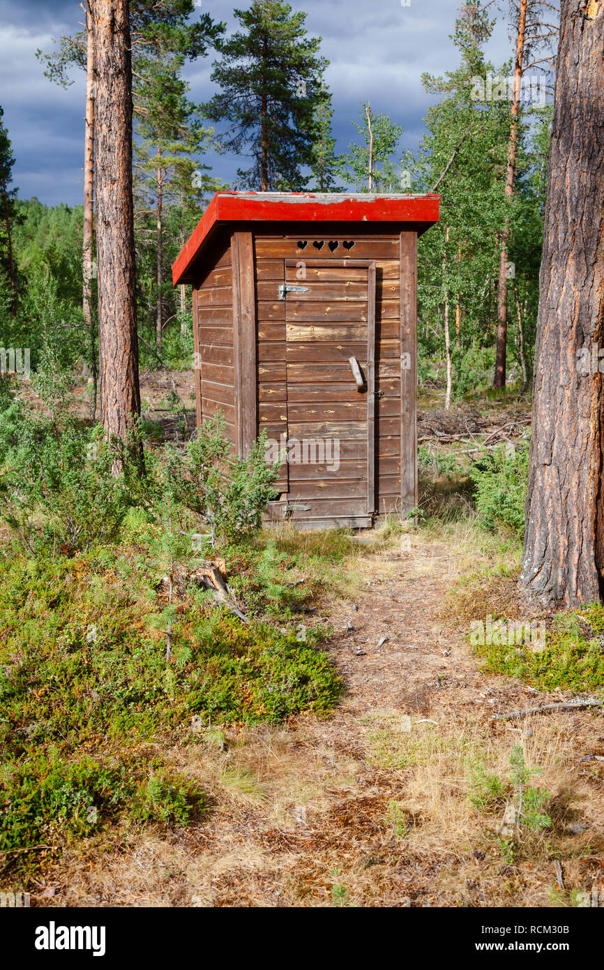 Wooden outhouse or toilet in a forest in Norway Stock Photo - Alamy