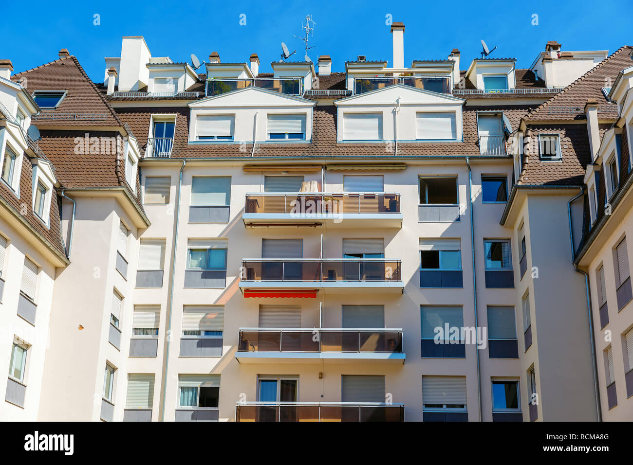 picture of the facade of an apartment block Stock Photo - Alamy
