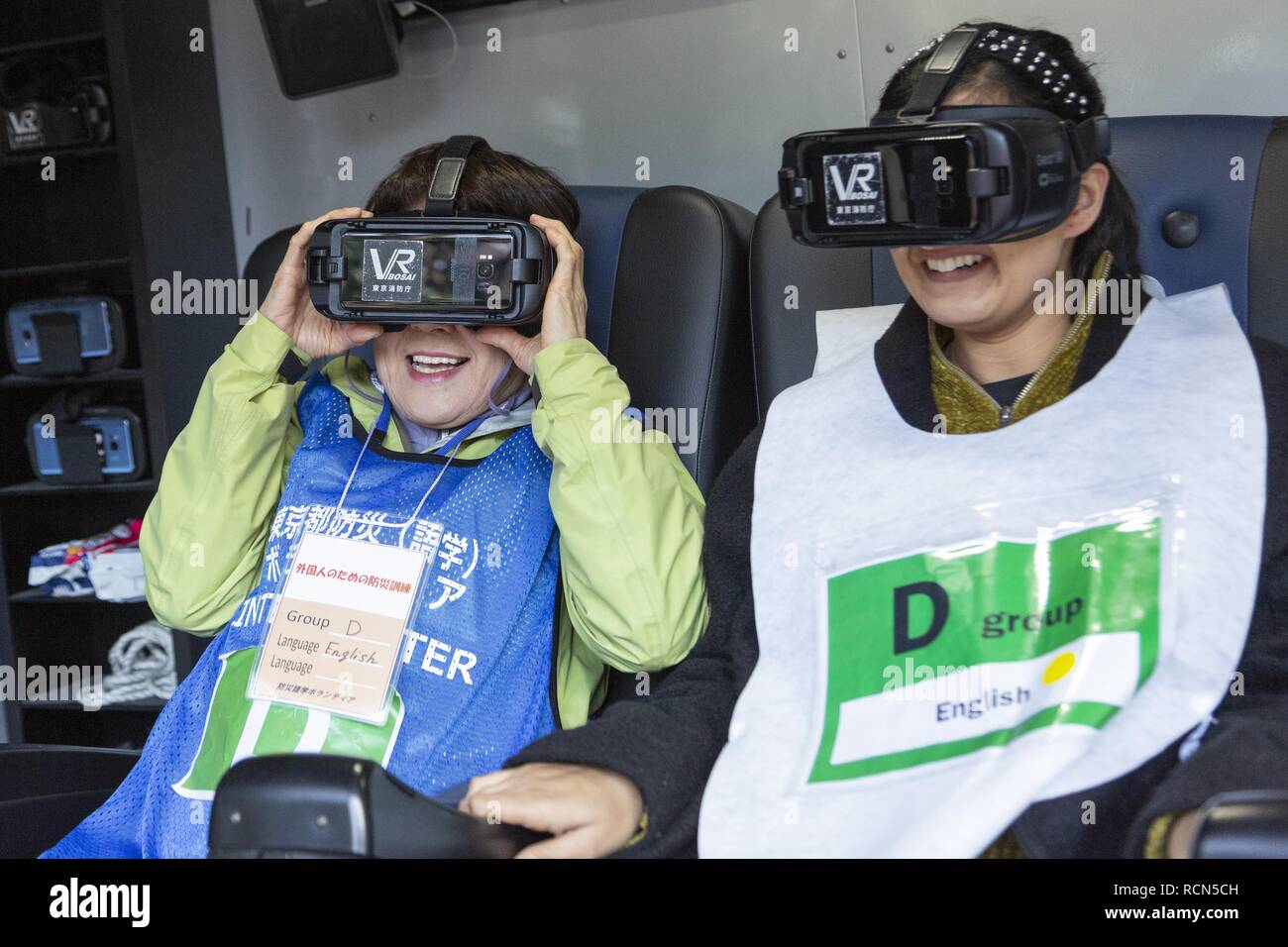 Tokyo, Japan. 16th Jan, 2019. Foreign residents wearing VR glasses try ...
