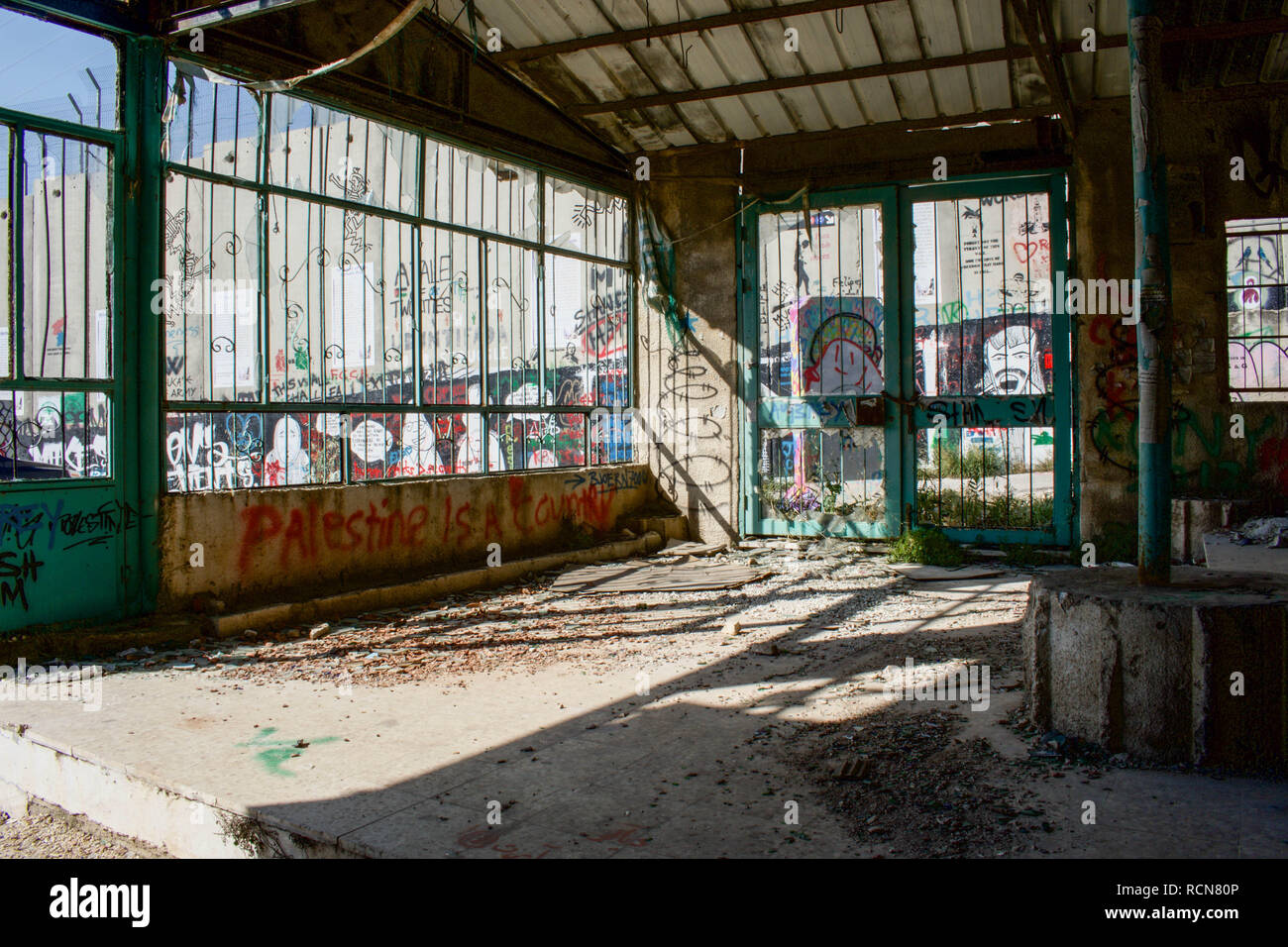 A building destroyed by Israeli raids and bombs seen next to the ...