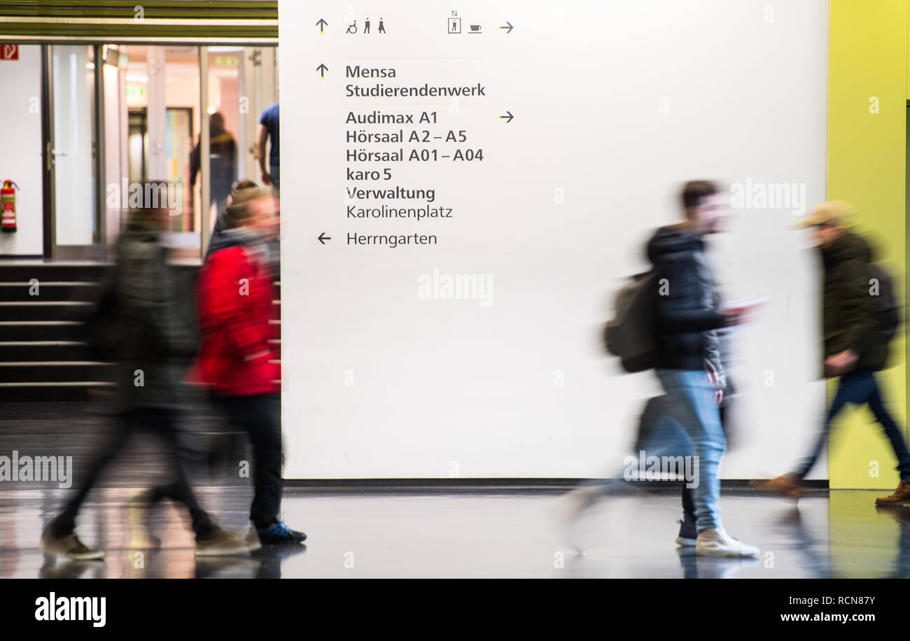 Darmstadt, Germany. 15th Jan, 2019. Students walk through a building of ...