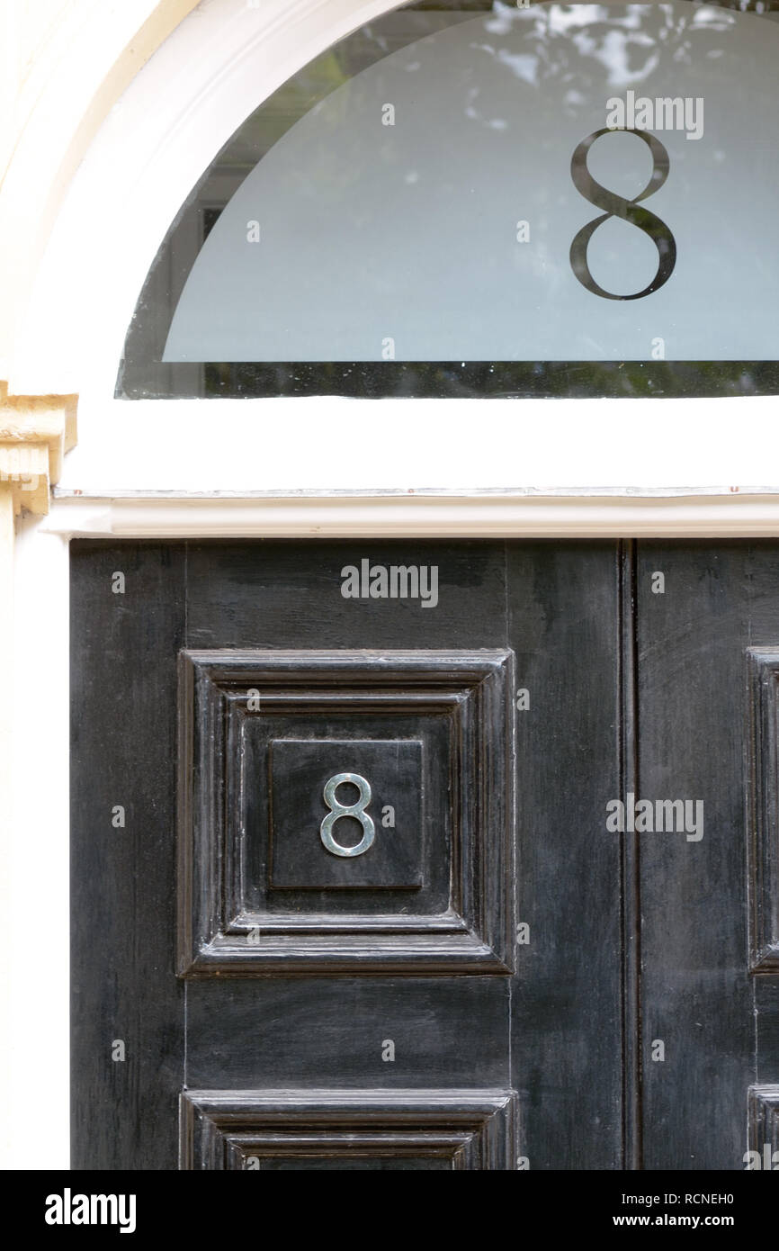 House number 8 sign on door Stock Photo - Alamy