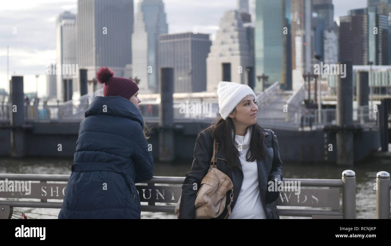Two friends travel to New York for sightseeing Stock Photo - Alamy