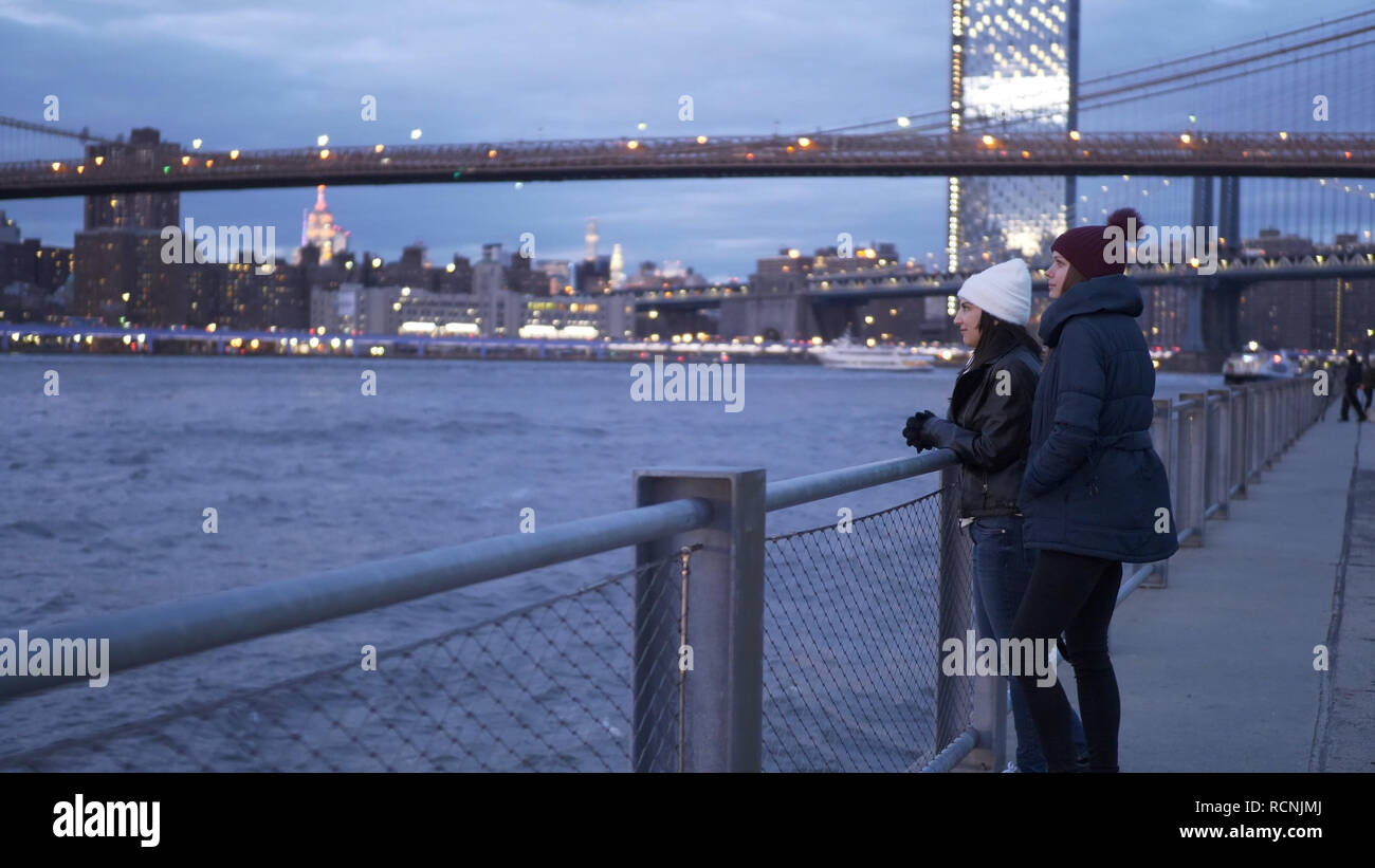 Two friends travel to New York for sightseeing Stock Photo - Alamy