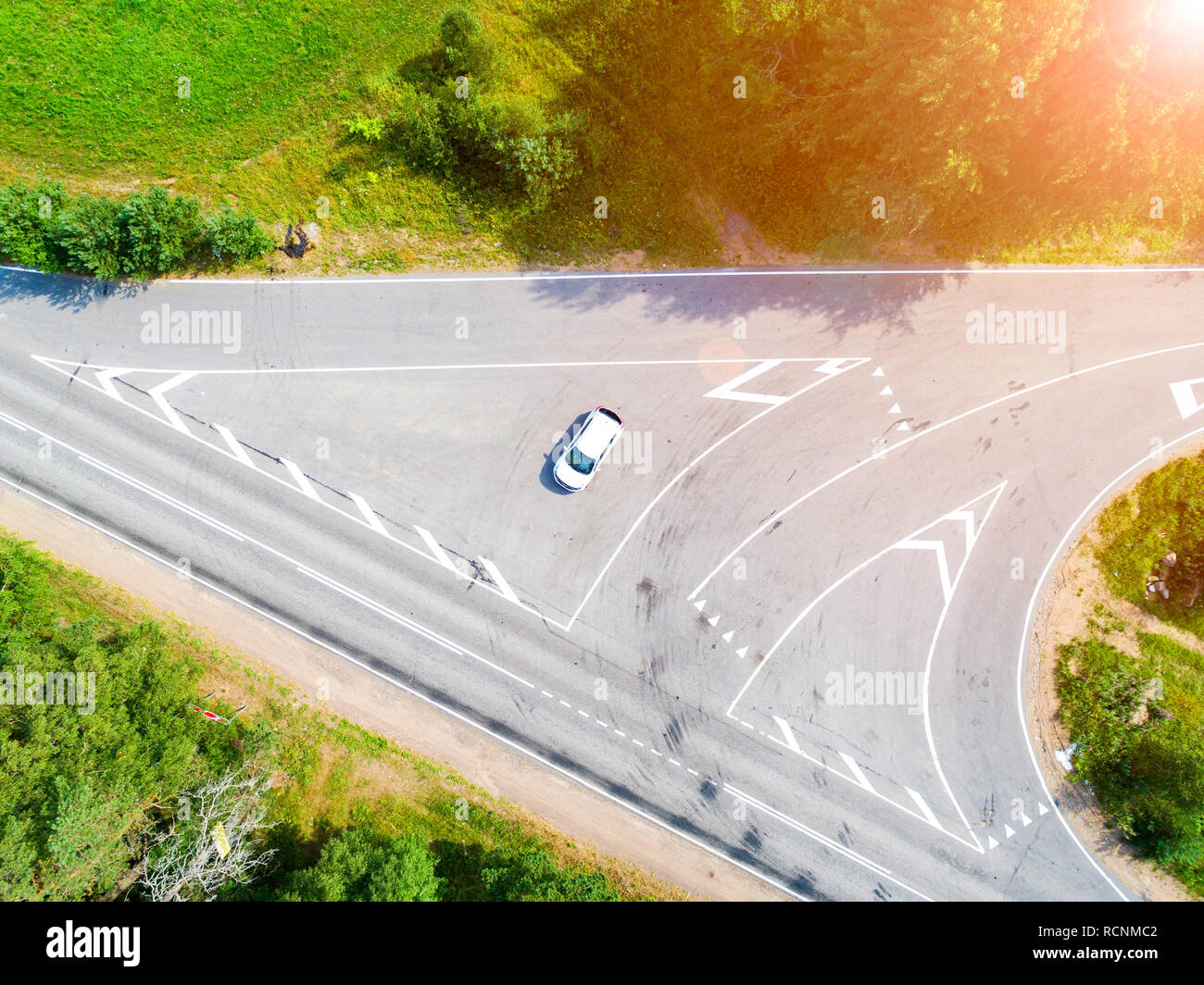 Aerial view of highway. Aerial view of a country road with moving car ...