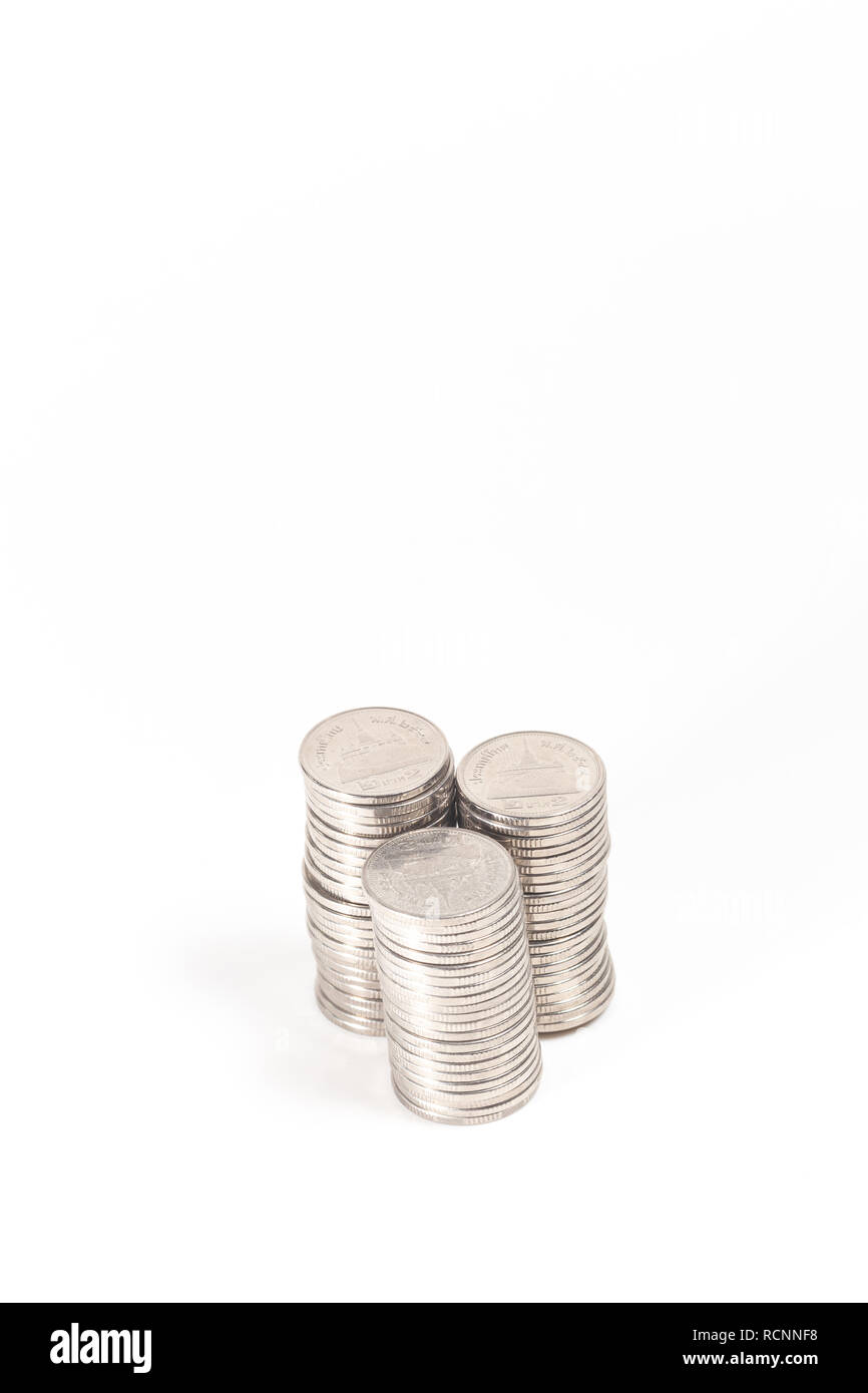 Pile of silver coins on white background Stock Photo - Alamy