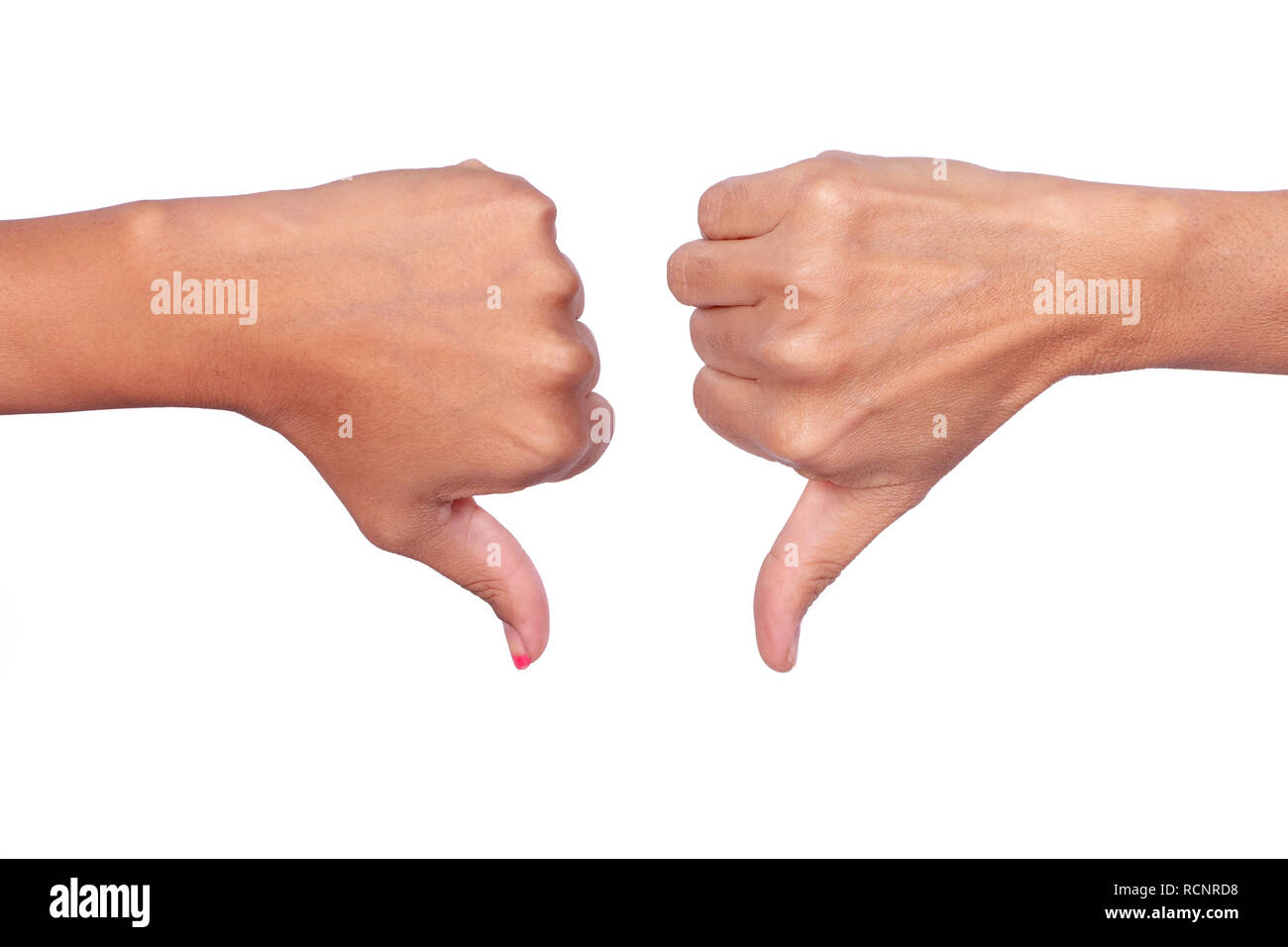 Female hands making signals with the thumb down Stock Photo - Alamy