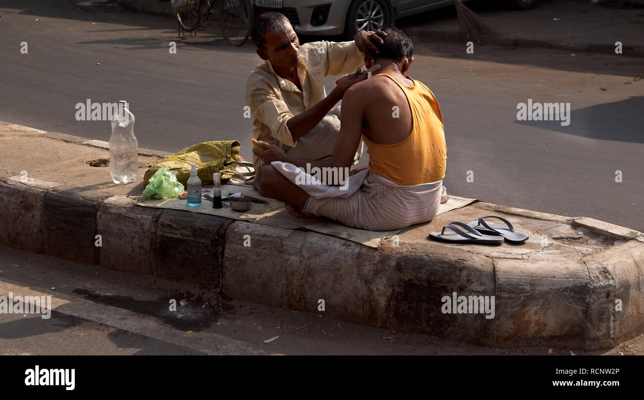 Street barber set up on middle of road Stock Photo - Alamy