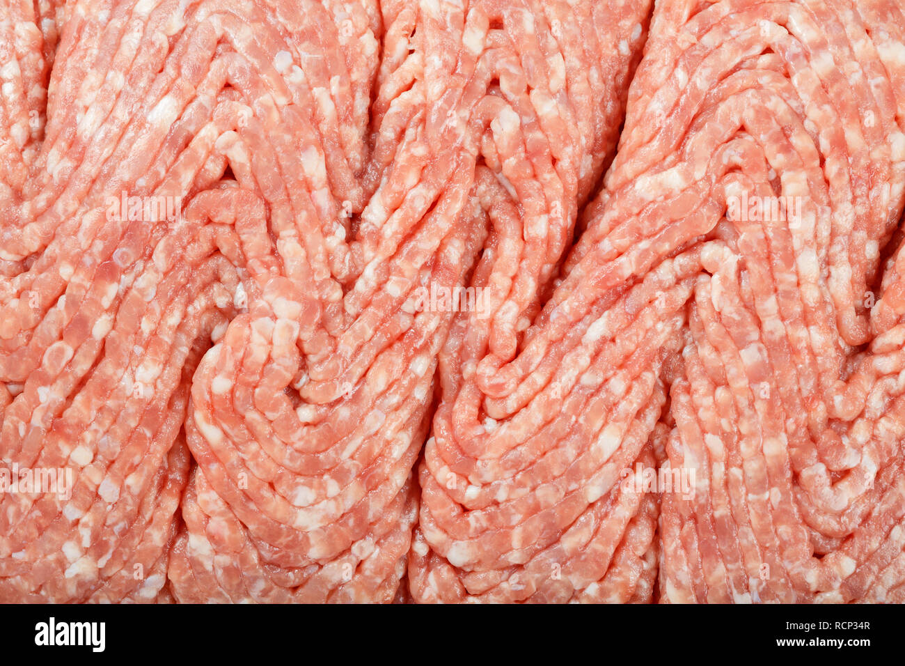 Red fresh ground pork meat food background Stock Photo - Alamy