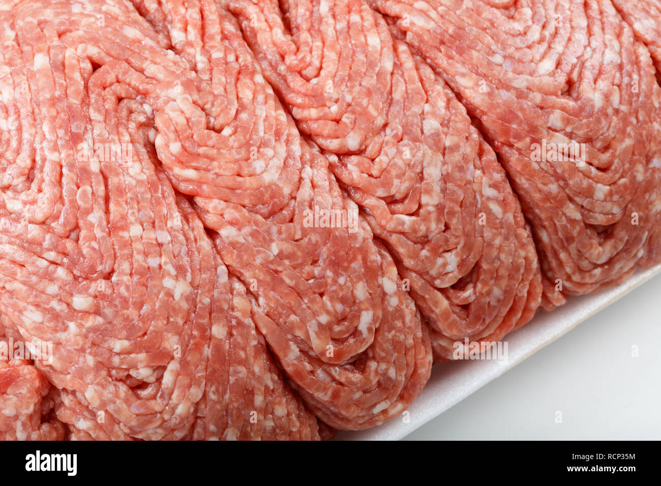 Red Ground Pork Meat on white background Stock Photo - Alamy