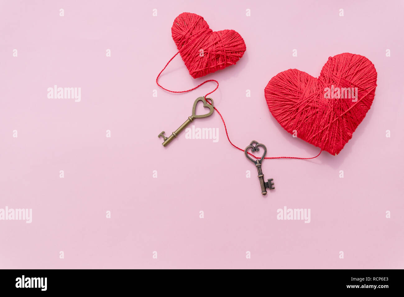 Bronze skeleton key and pink knitted hearts,antique rustic keys on pink ...
