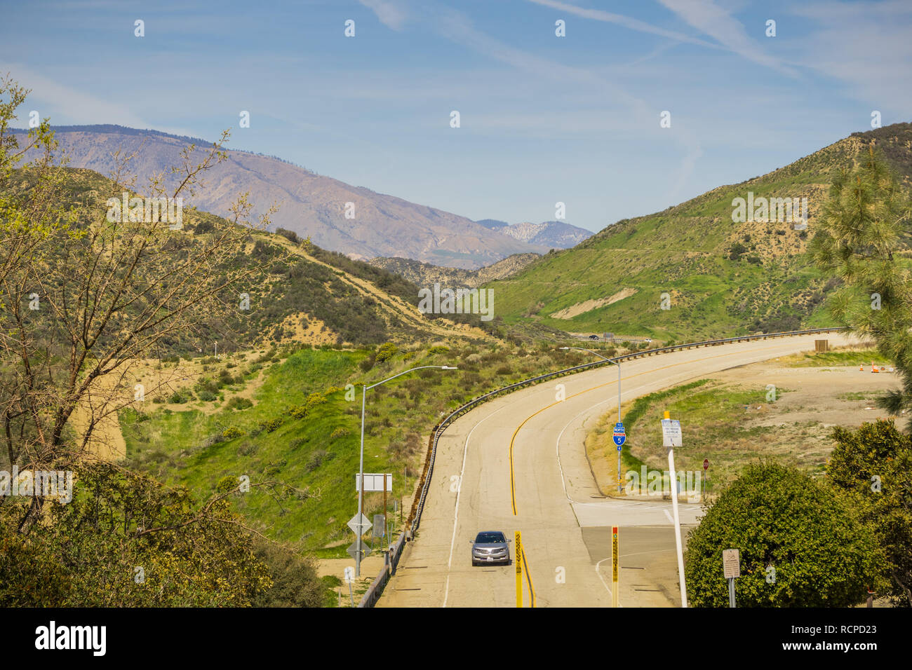 Road leading to Pyramid Lake as seen from Vista del Lago rest area on ...
