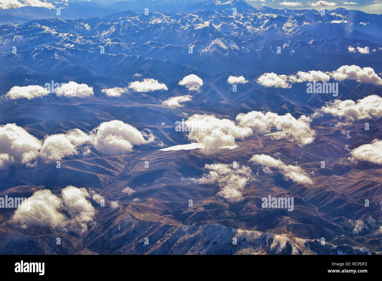 Aerial view of topographical Rocky Mountain landscapes on flight over ...