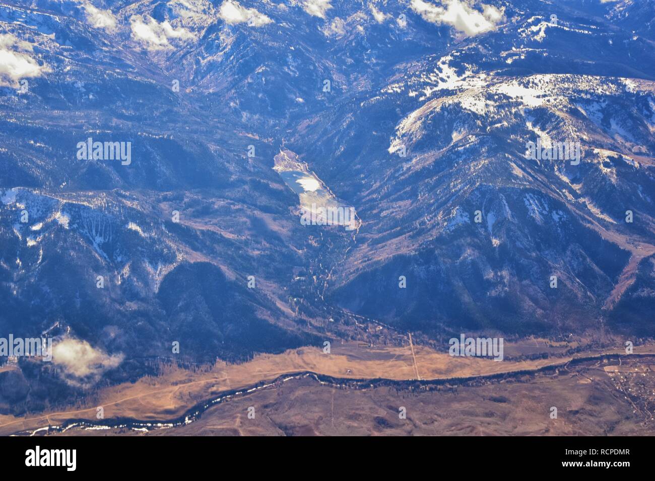 Aerial view of topographical Rocky Mountain landscapes on flight over ...