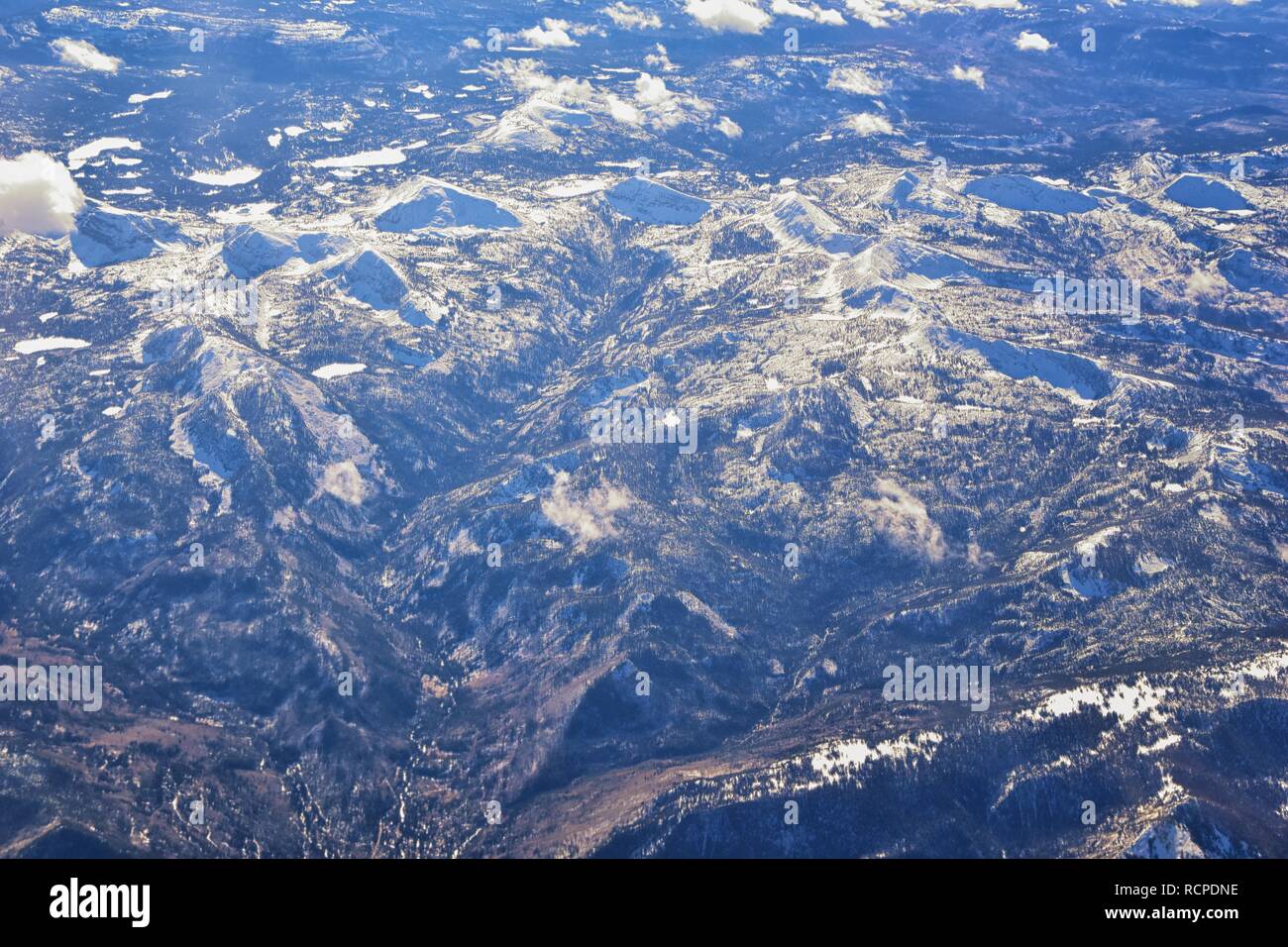 Aerial view of topographical Rocky Mountain landscapes on flight over ...