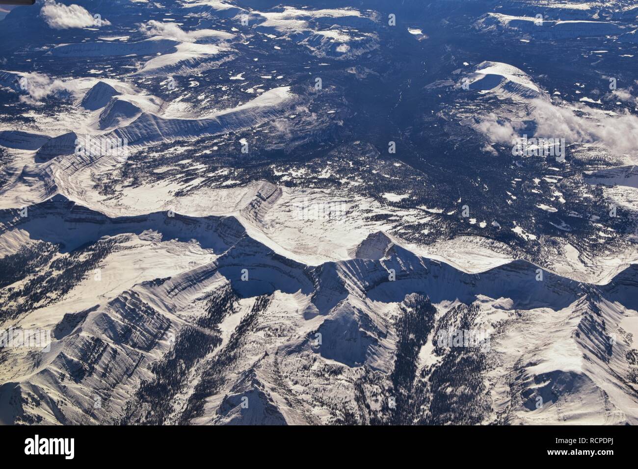 Aerial view of topographical Rocky Mountain landscapes on flight over ...