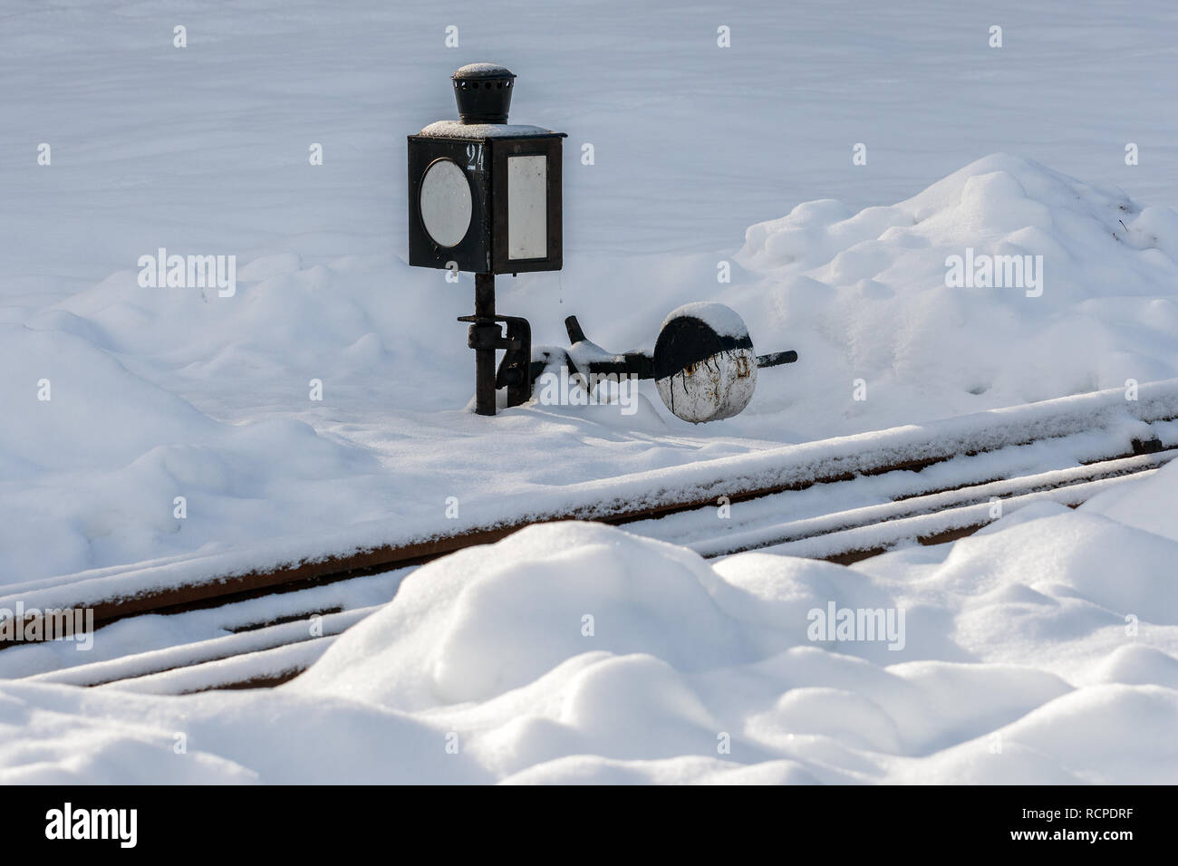 Railroad switch in the snow, Fichtelberg railway Stock Photo - Alamy