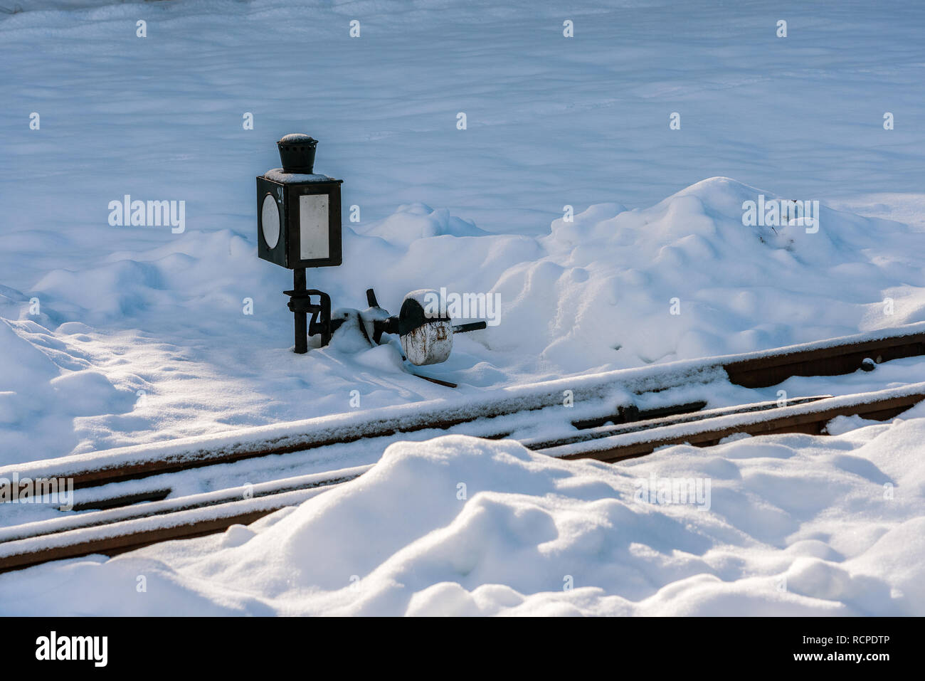 Railroad switch in the snow, Fichtelberg railway Stock Photo - Alamy