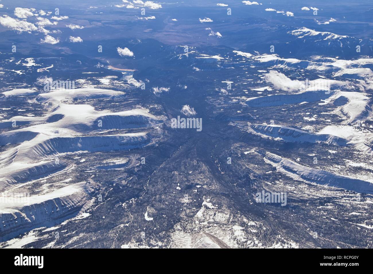Aerial view of topographical Rocky Mountain landscapes on flight over ...