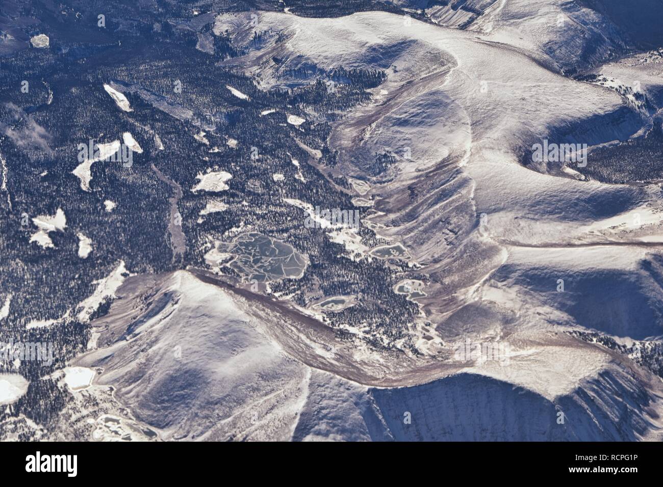 Aerial view of topographical Rocky Mountain landscapes on flight over ...