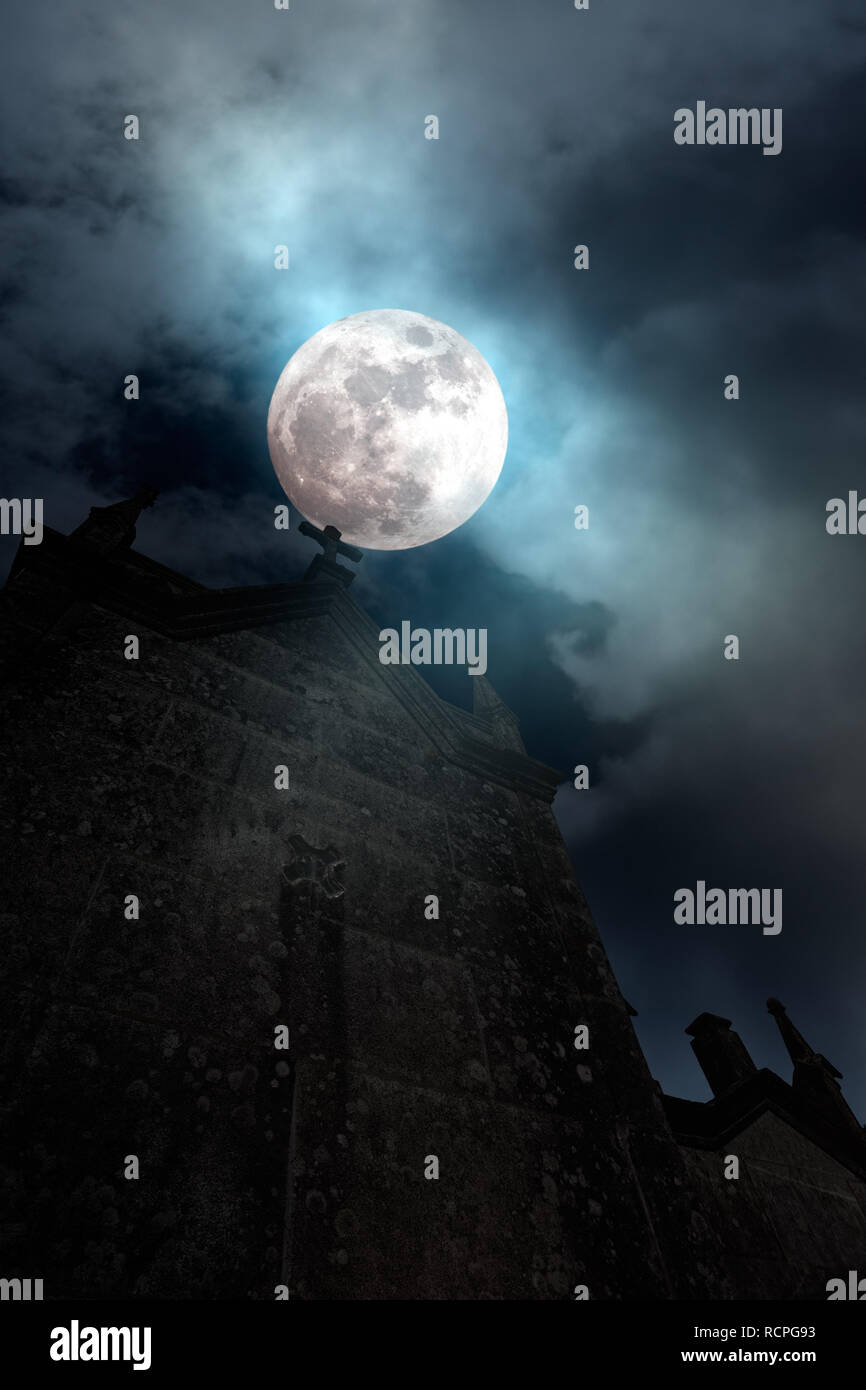 Foggy full moon over old cemetery Stock Photo - Alamy