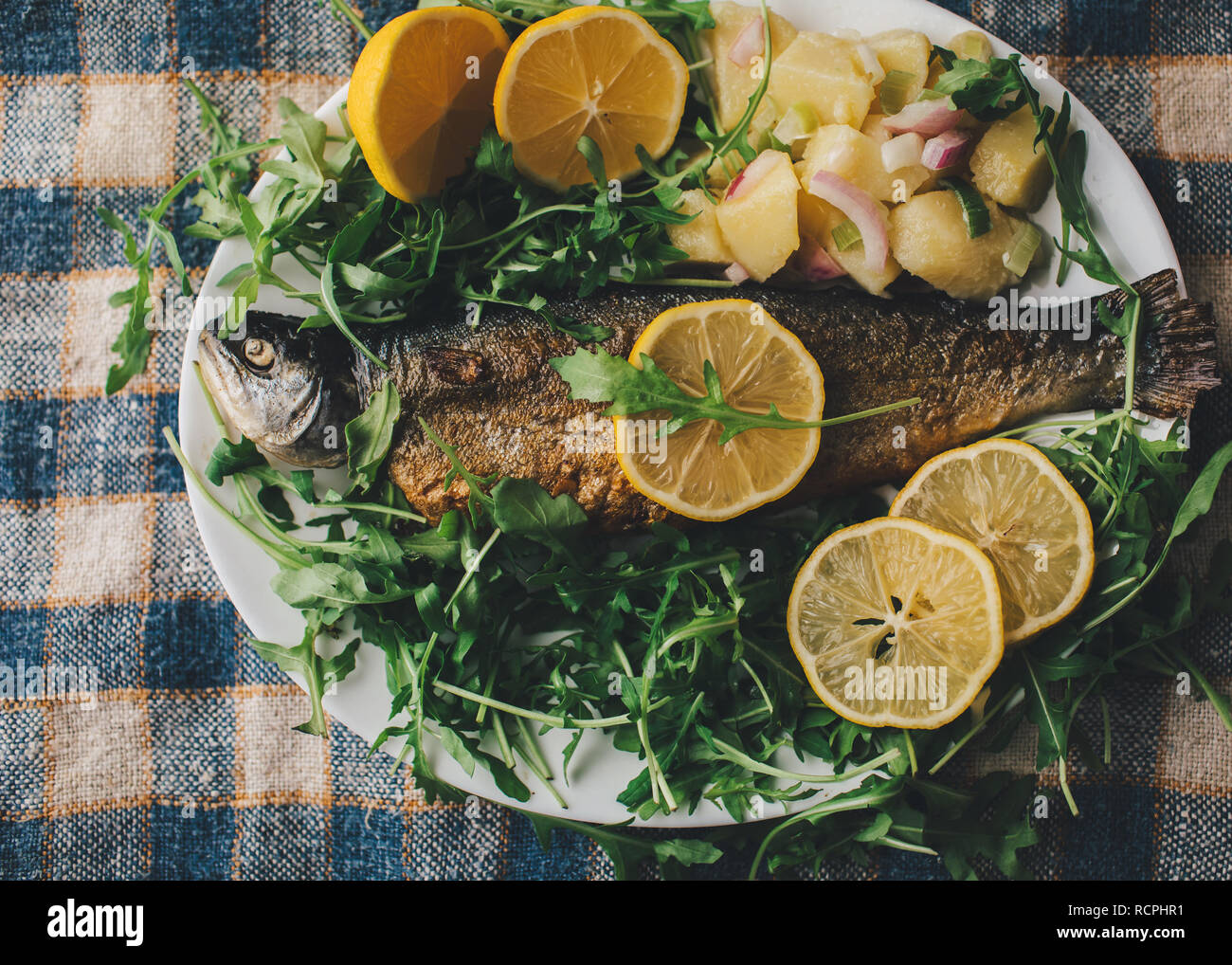 The served fish with salad hi-res stock photography and images - Alamy