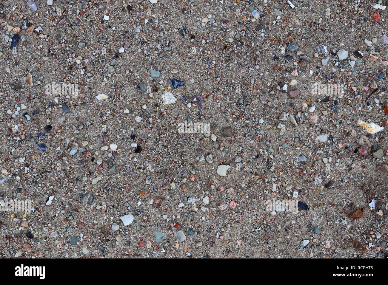 Close up high resolution surface of sand with footprints on the ground ...