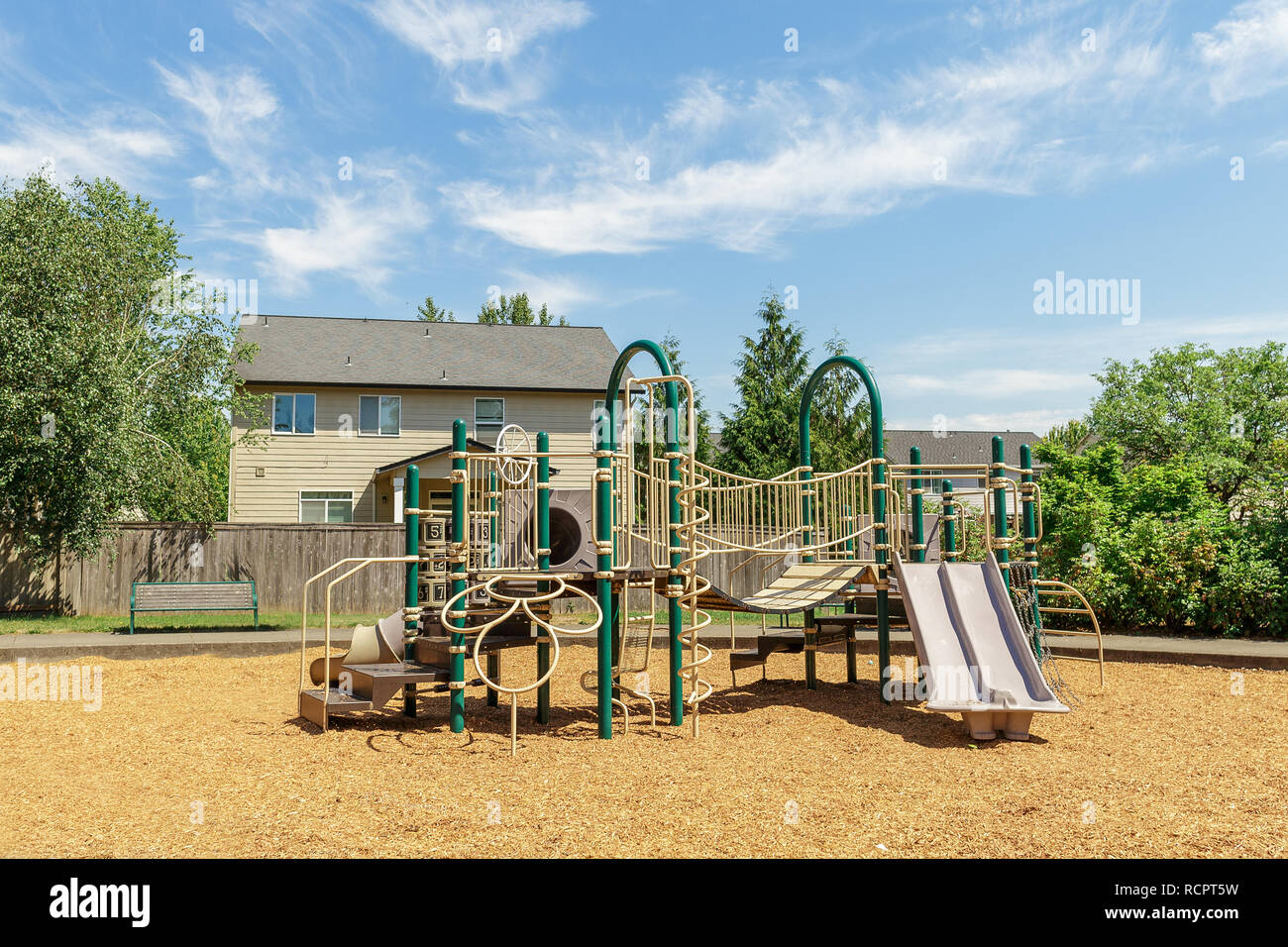Children public playground in neighborhood in summer. Outside ...