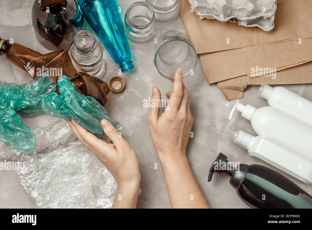 Hands sorting hi-res stock photography and images - Alamy