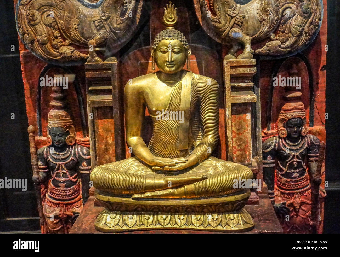 National Museum - Colombo, Sri Lanka - golden sitting Buddha Stock ...
