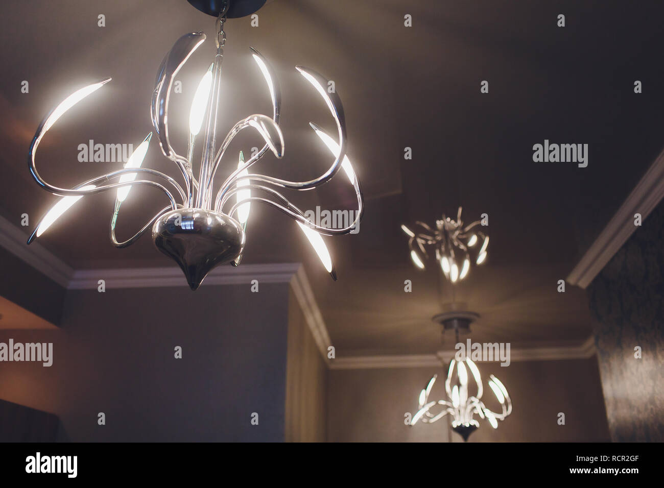 Close-up of a beautiful crystal chandelier Beautiful chandelier. luxury ...