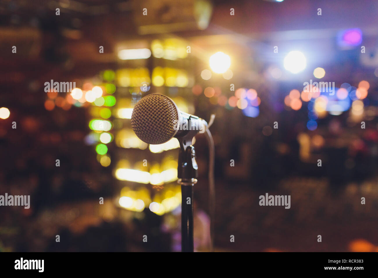 Close up microphone on stage in concert hall restaurant or conference ...