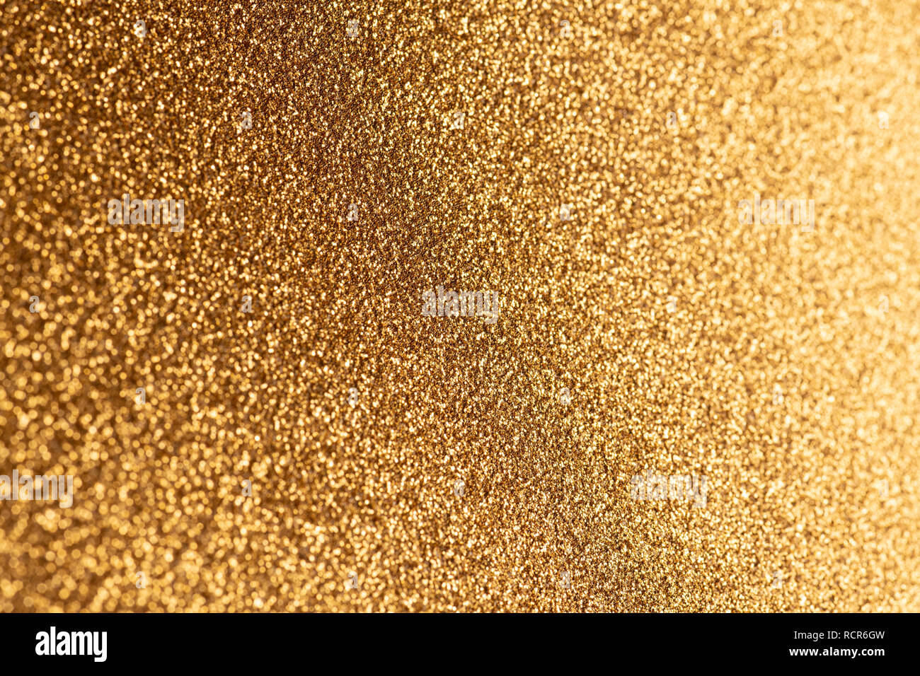 Detailed texture of glittering golden dust surface for christmas Stock ...