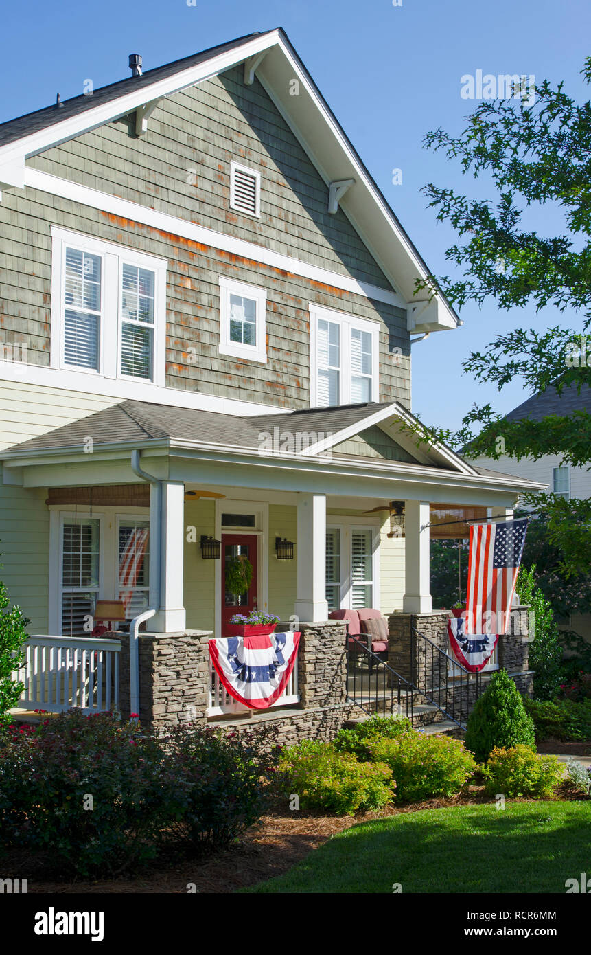 Row of Homes Flying the American Flag Stock Photo - Alamy