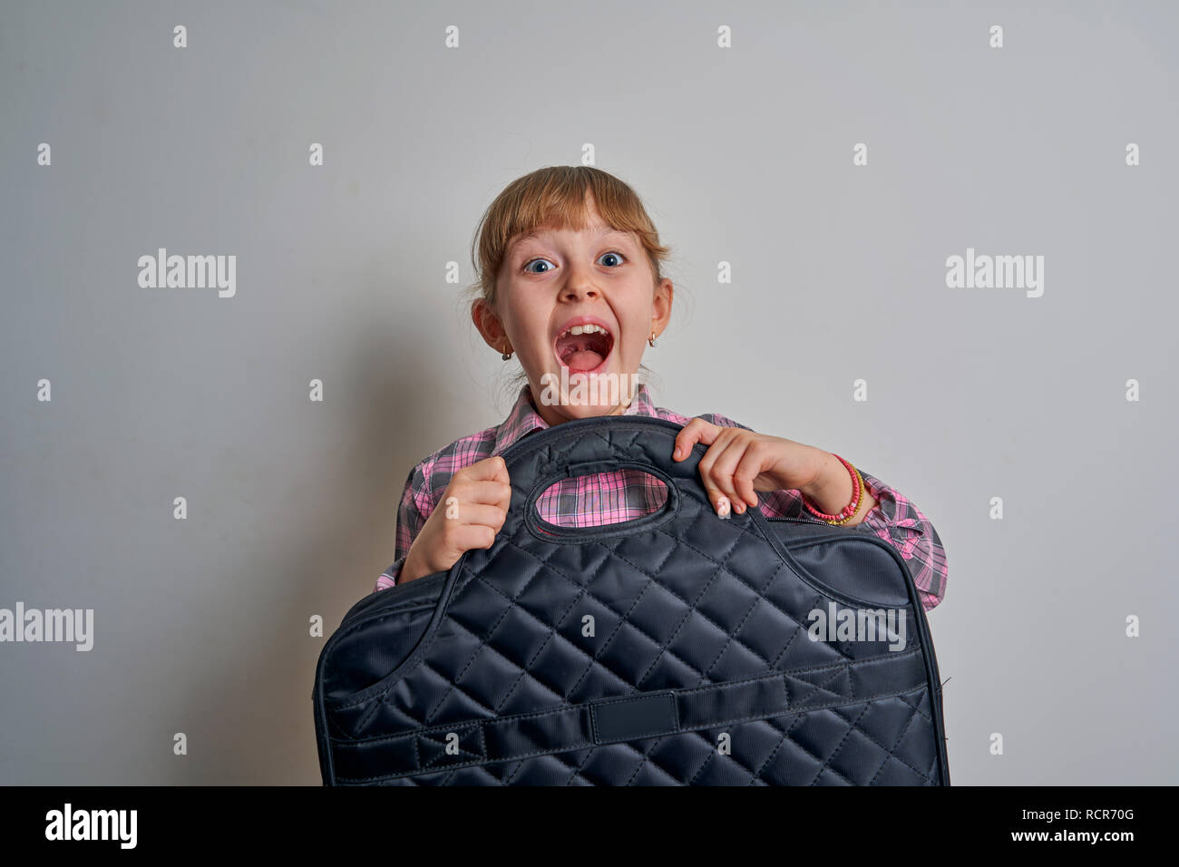 girl with briefcase on white background Stock Photo - Alamy