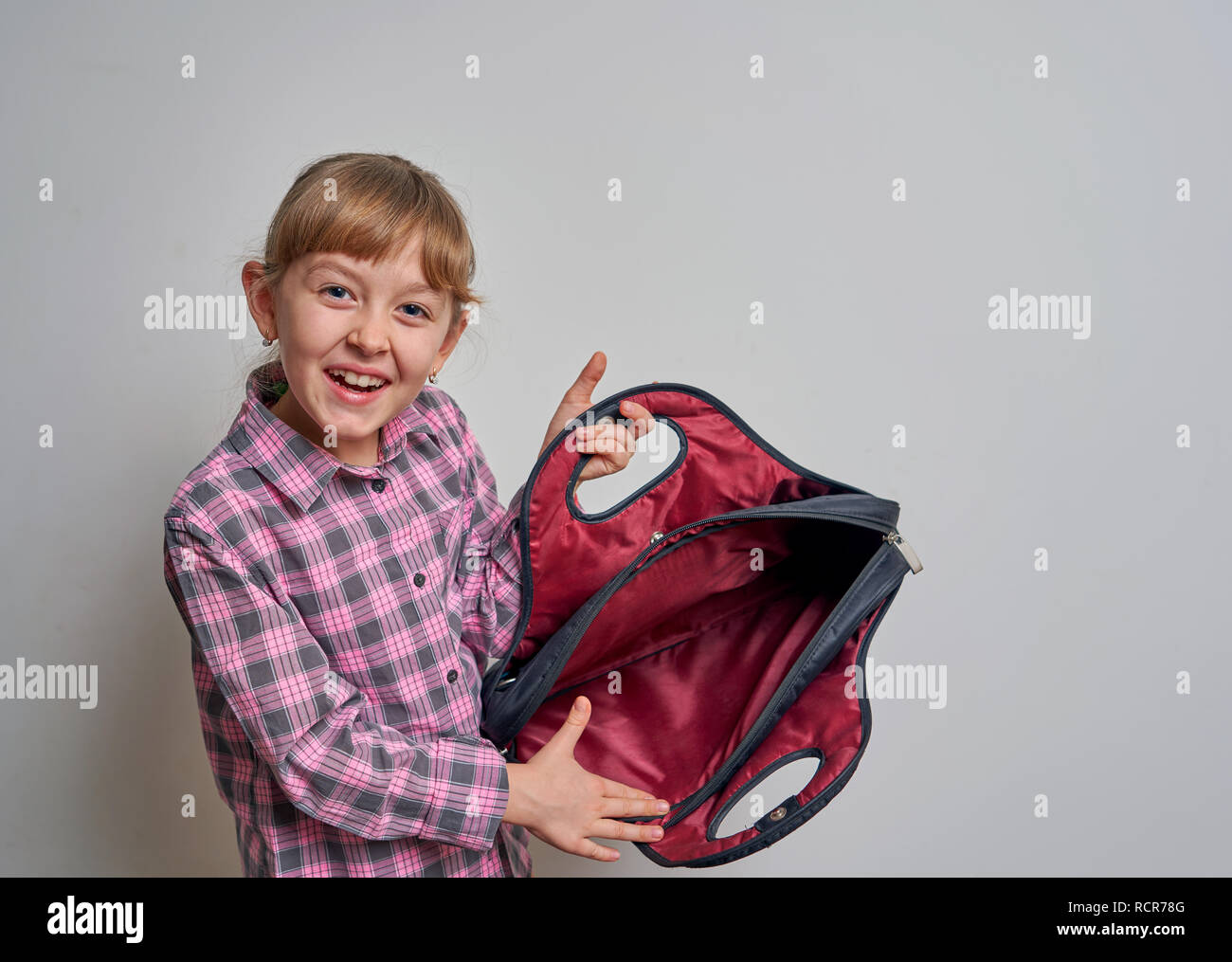 girl with briefcase on white background Stock Photo - Alamy