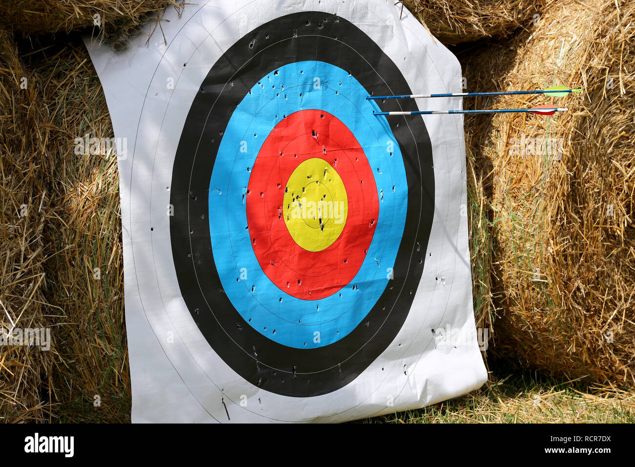 Practice target face with lot of shots. Used archery target on position ...