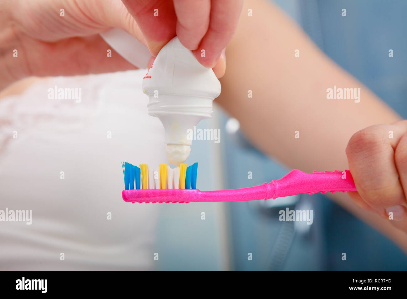 Dental health care. Closeup woman hands is holding toothbrush and ...
