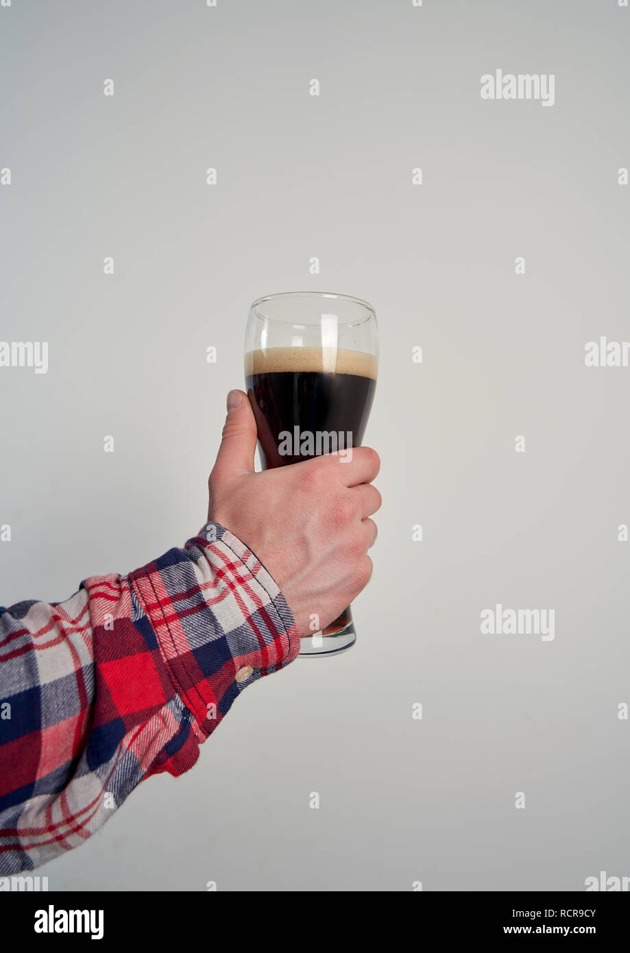 beer mug in hand on white background Stock Photo - Alamy