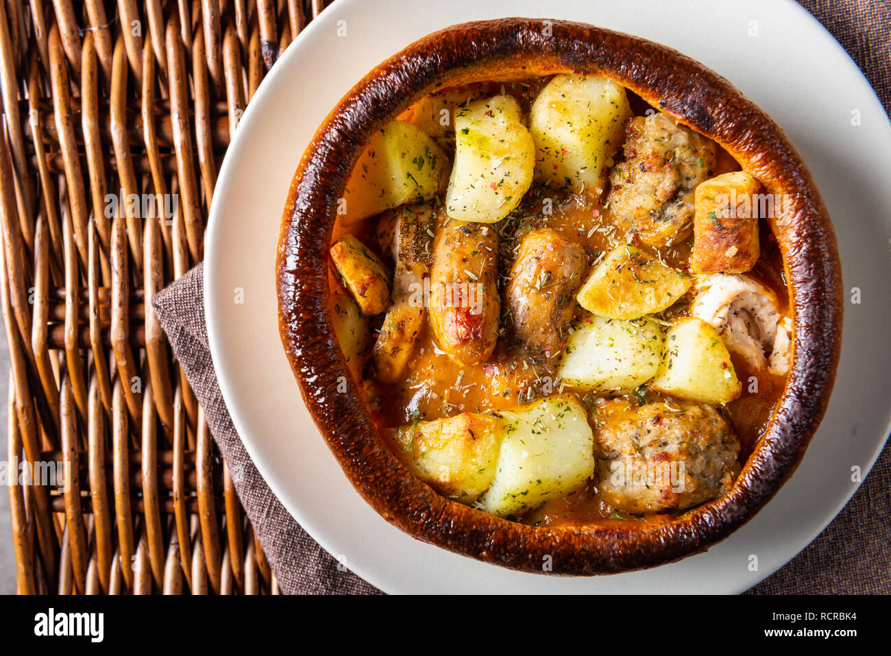 Open Pie with Potatoes and different kinds of meat Stock Photo - Alamy