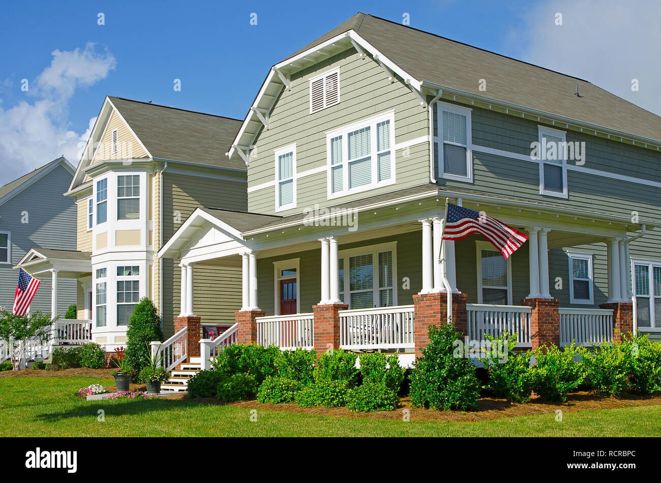 Victorian homes flying american flag hi-res stock photography and ...